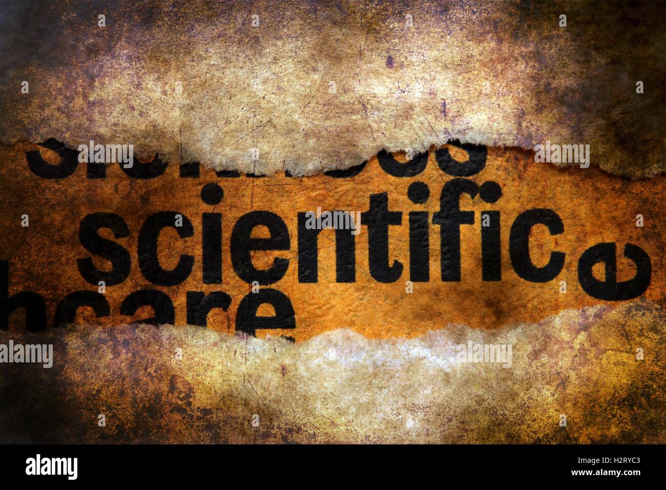 Scientific text on torn paper Stock Photo - Alamy