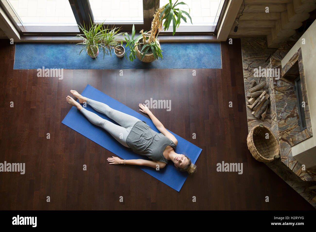 Yoga at home: relaxation Stock Photo - Alamy