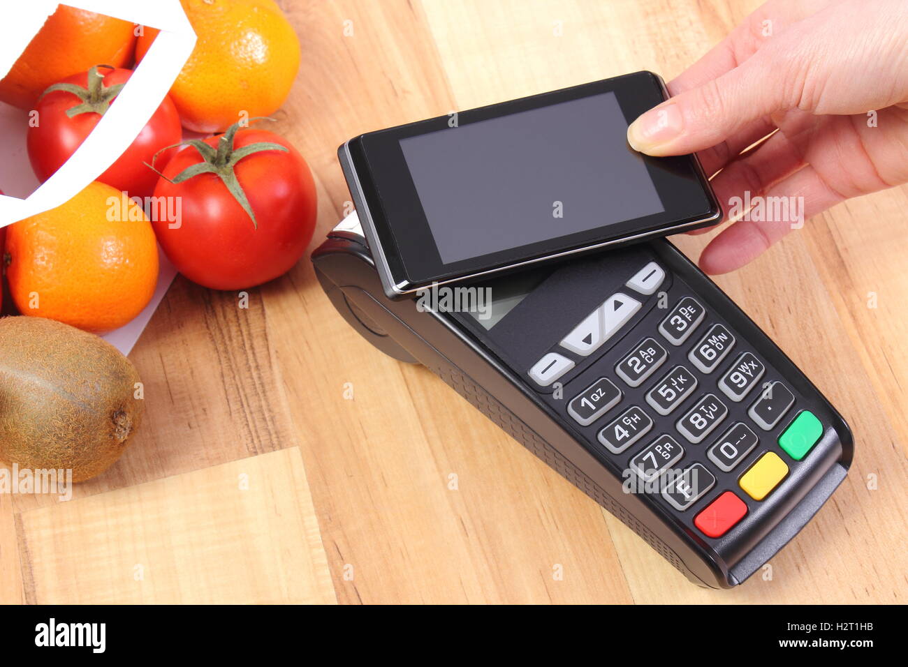 Using credit card reader, payment terminal with mobile phone with NFC ...