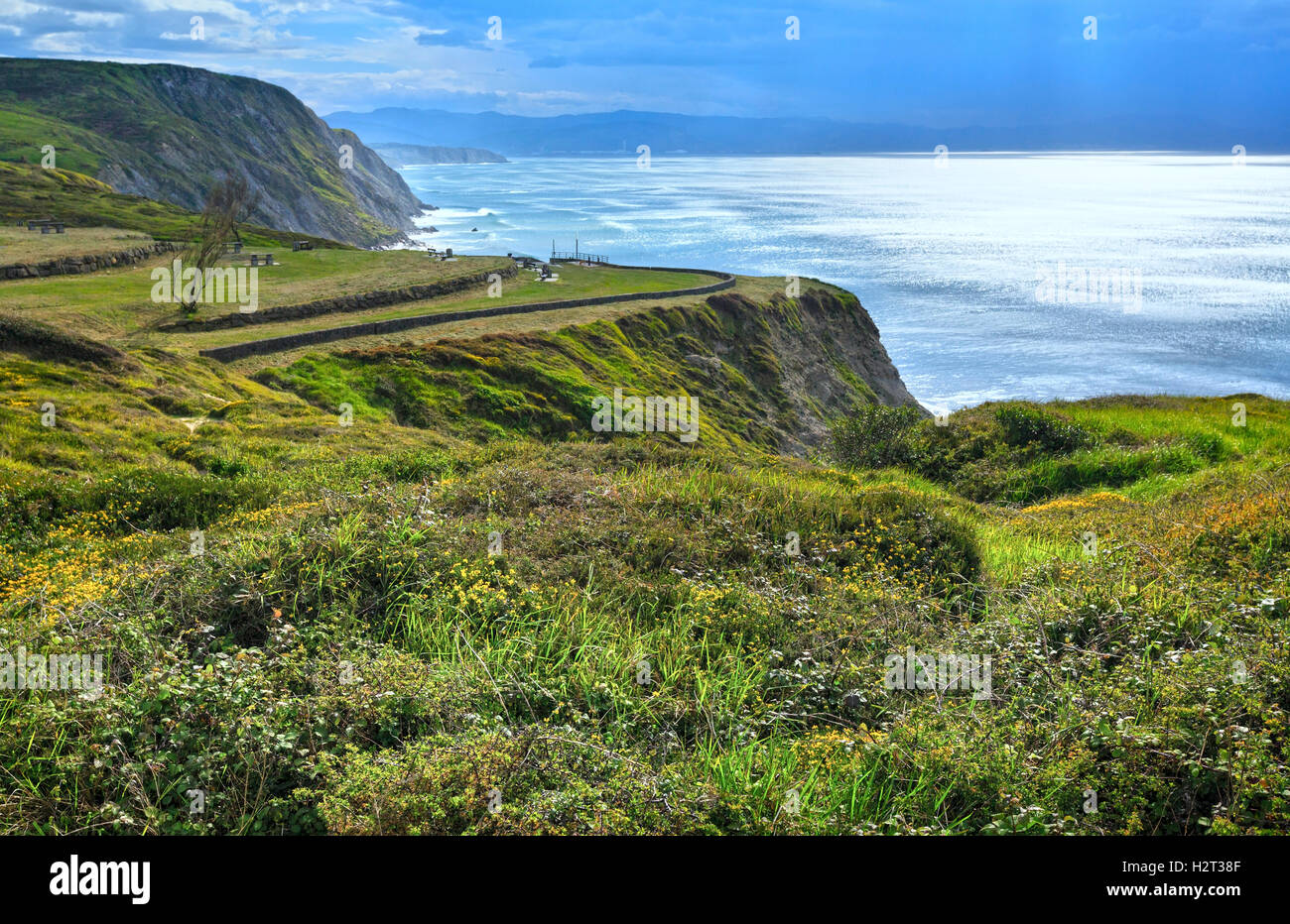 Summer evening ocean coastline view near beach in Barrika town, Biscay ...