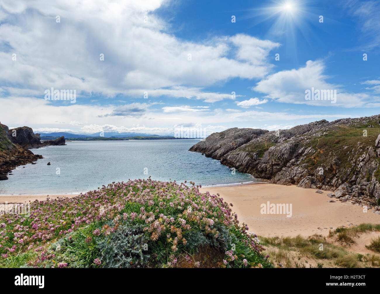 Sandy beach (Spain). Atlantic Ocean coastline and sunshine between ...
