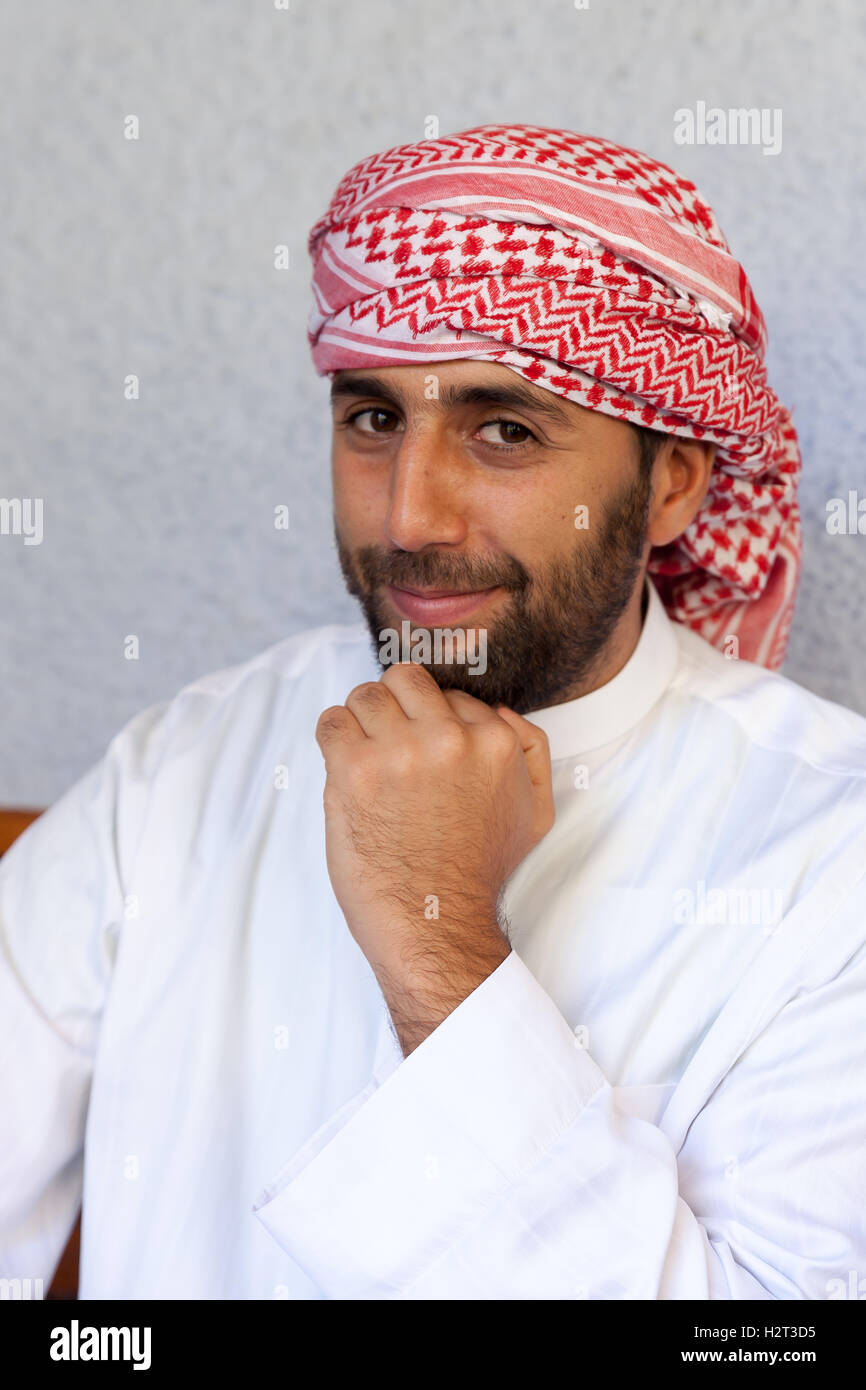 Young smiling handsome arabic man wearing traditional clothes Stock ...