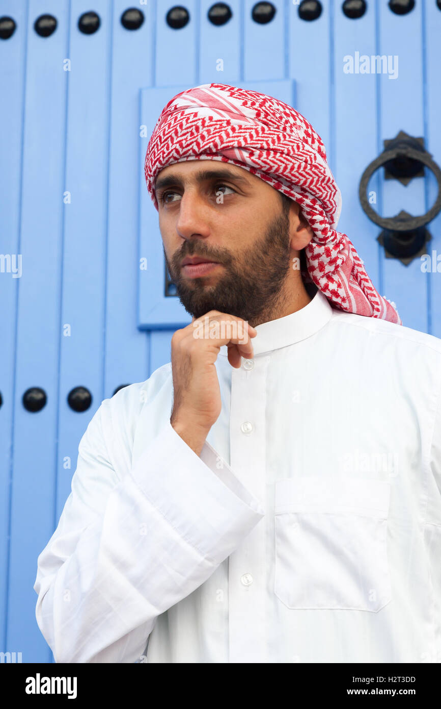 Young smiling handsome arabic man wearing traditional clothes Stock ...