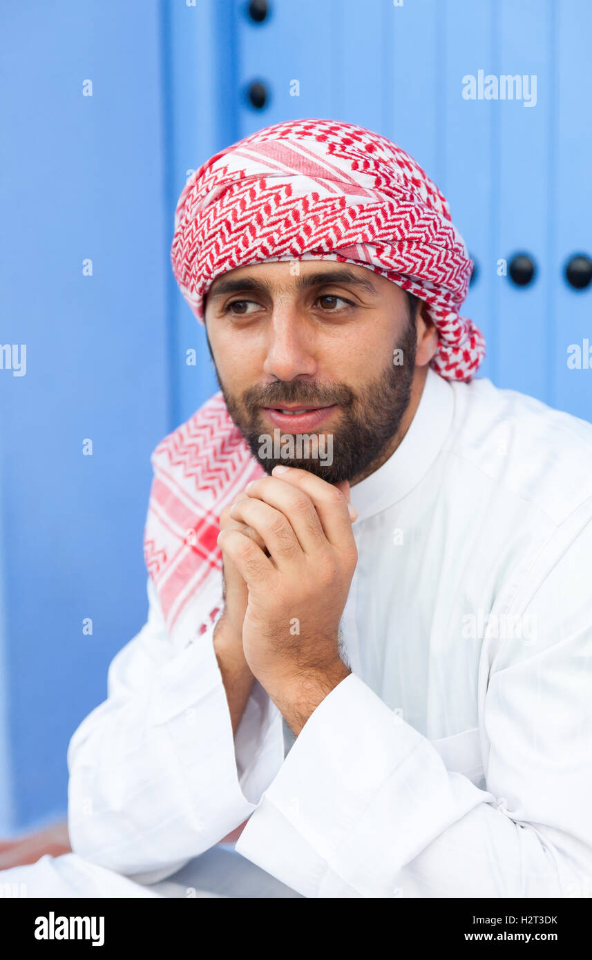 Young smiling handsome arabic man wearing traditional clothes Stock ...
