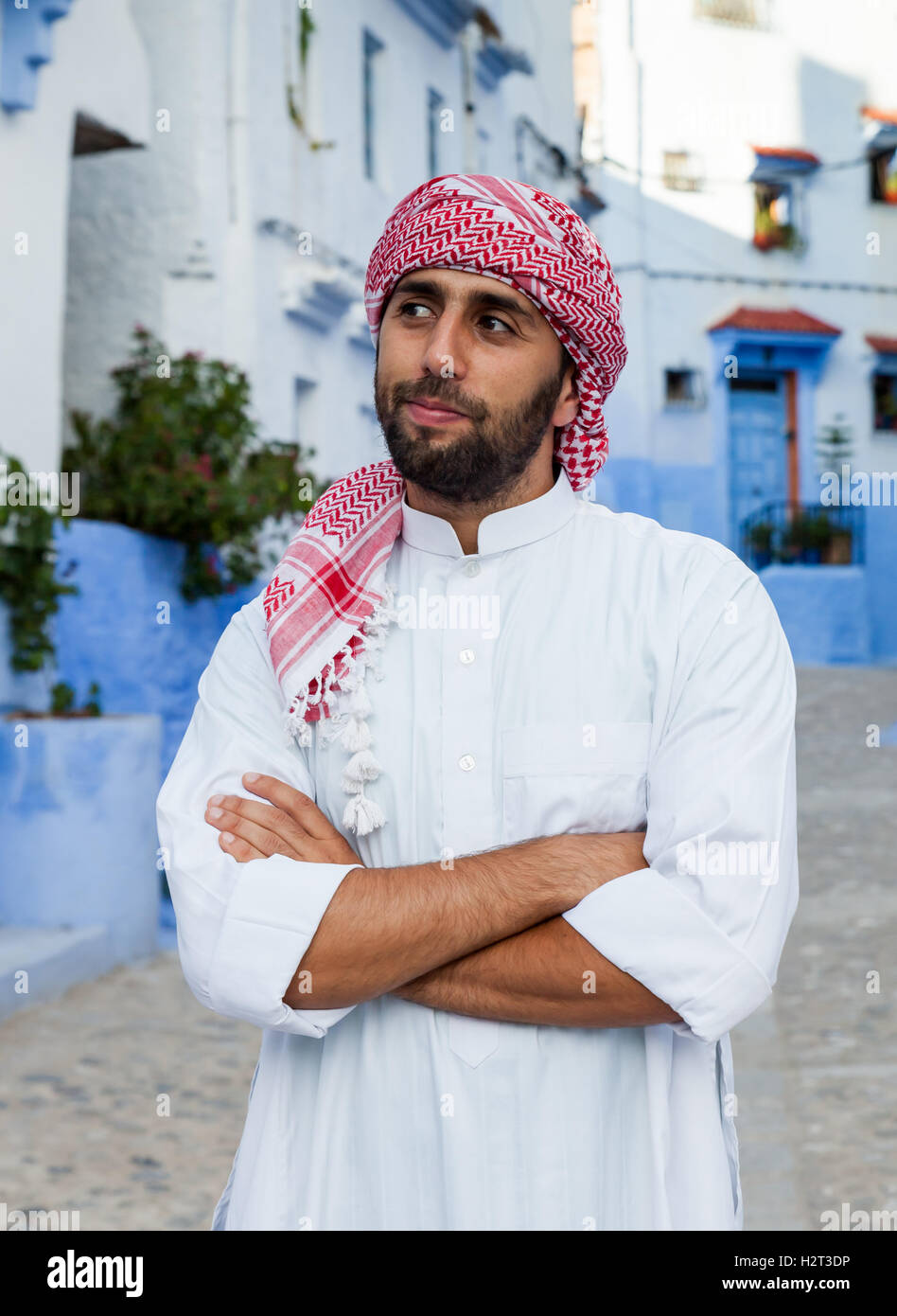 Young smiling handsome arabic man wearing traditional clothes Stock ...
