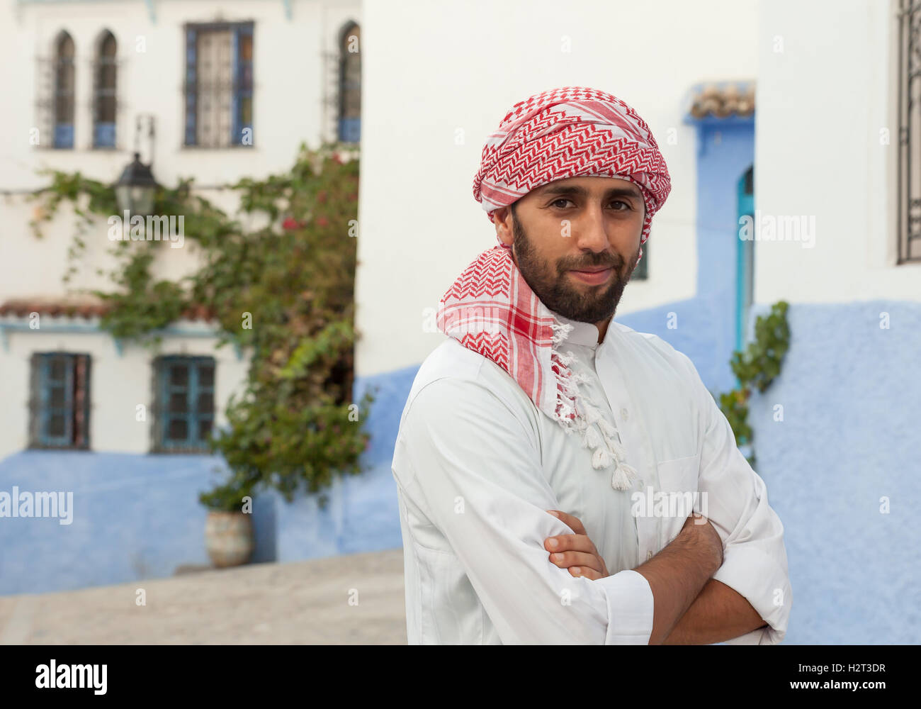 Young smiling handsome arabic man wearing traditional clothes Stock ...