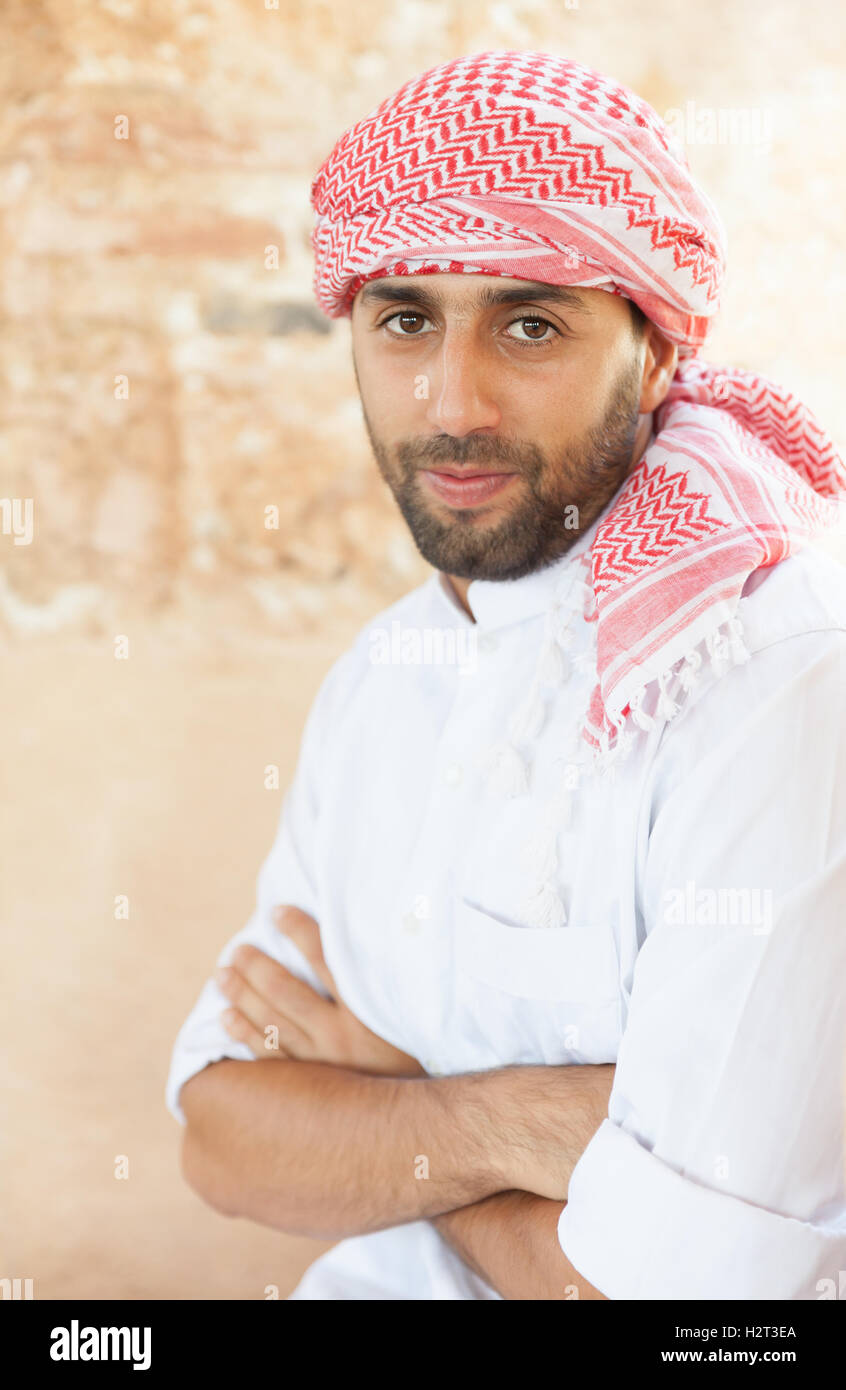 Young smiling handsome arabic man wearing traditional clothes Stock ...