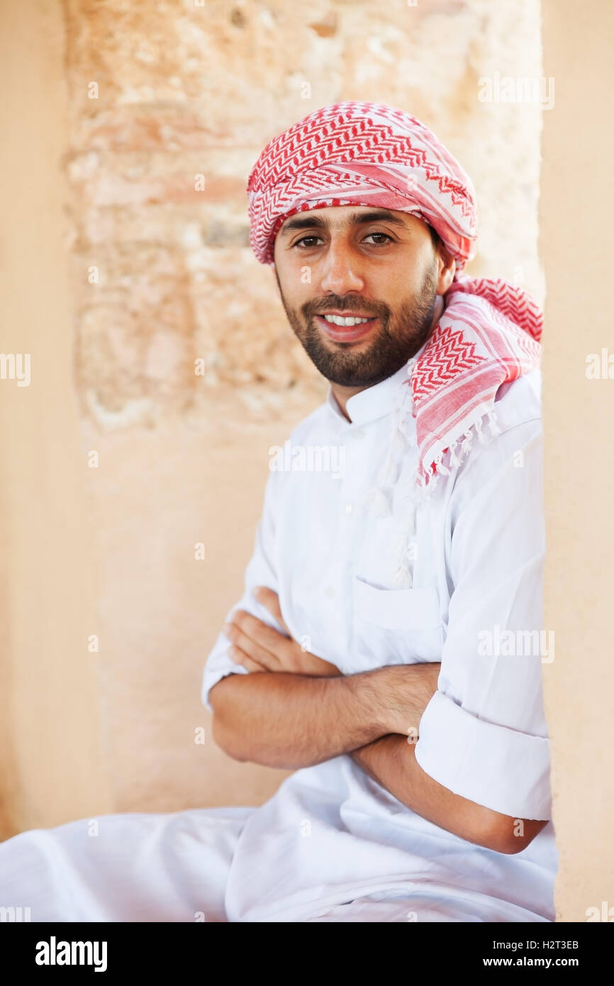 Young smiling handsome arabic man wearing traditional clothes Stock ...