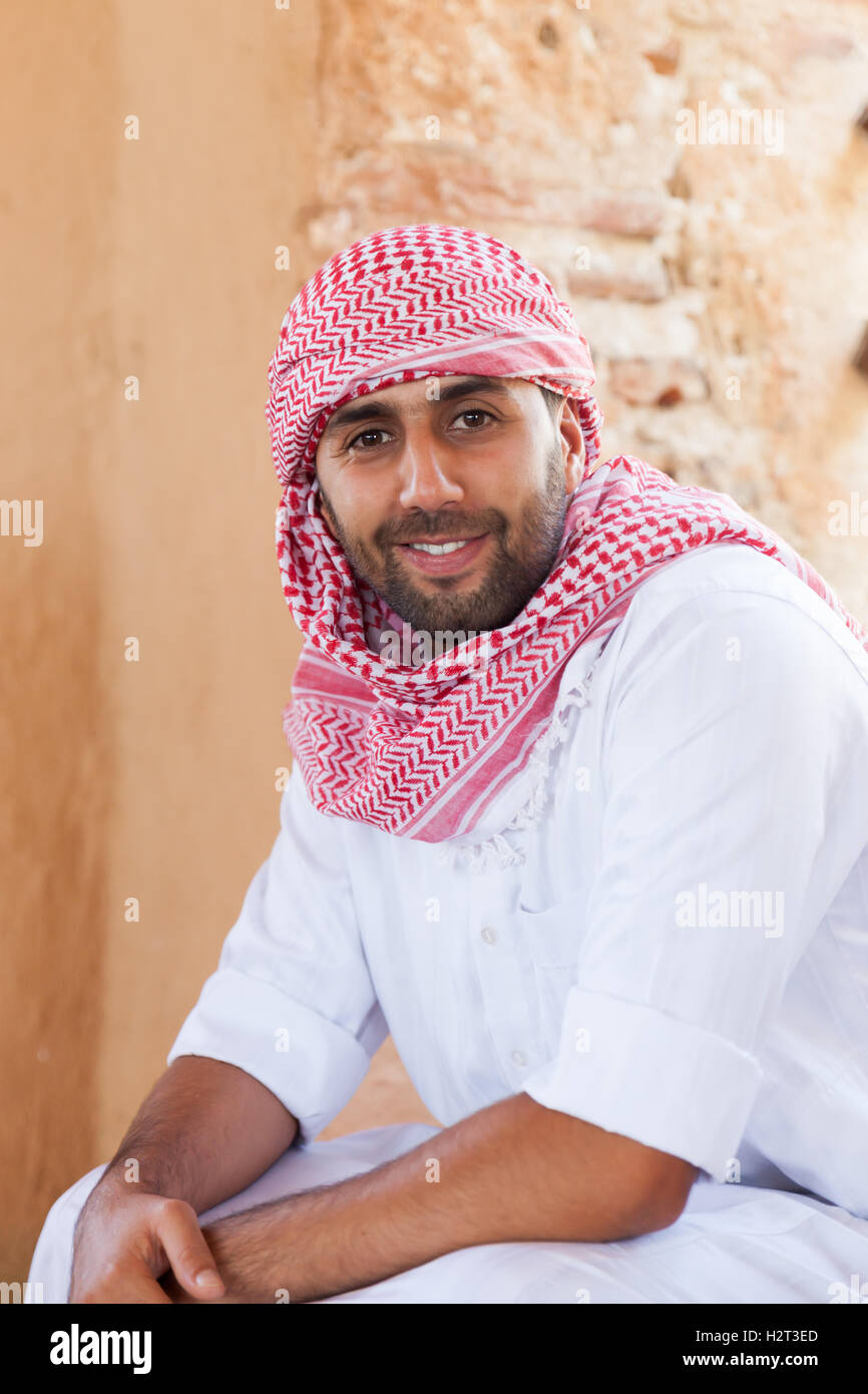 Young smiling handsome arabic man wearing traditional clothes Stock ...