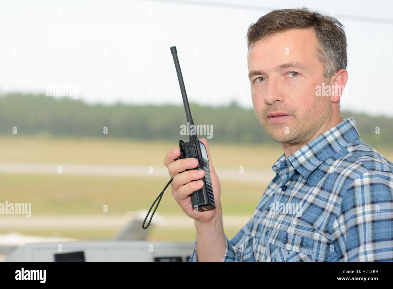 Man holding radio receiver Stock Photo - Alamy