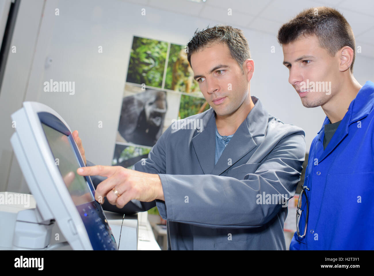 Operating printing machine hi-res stock photography and images - Alamy