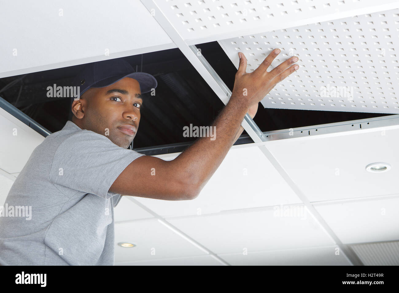 fixing the ceiling Stock Photo - Alamy