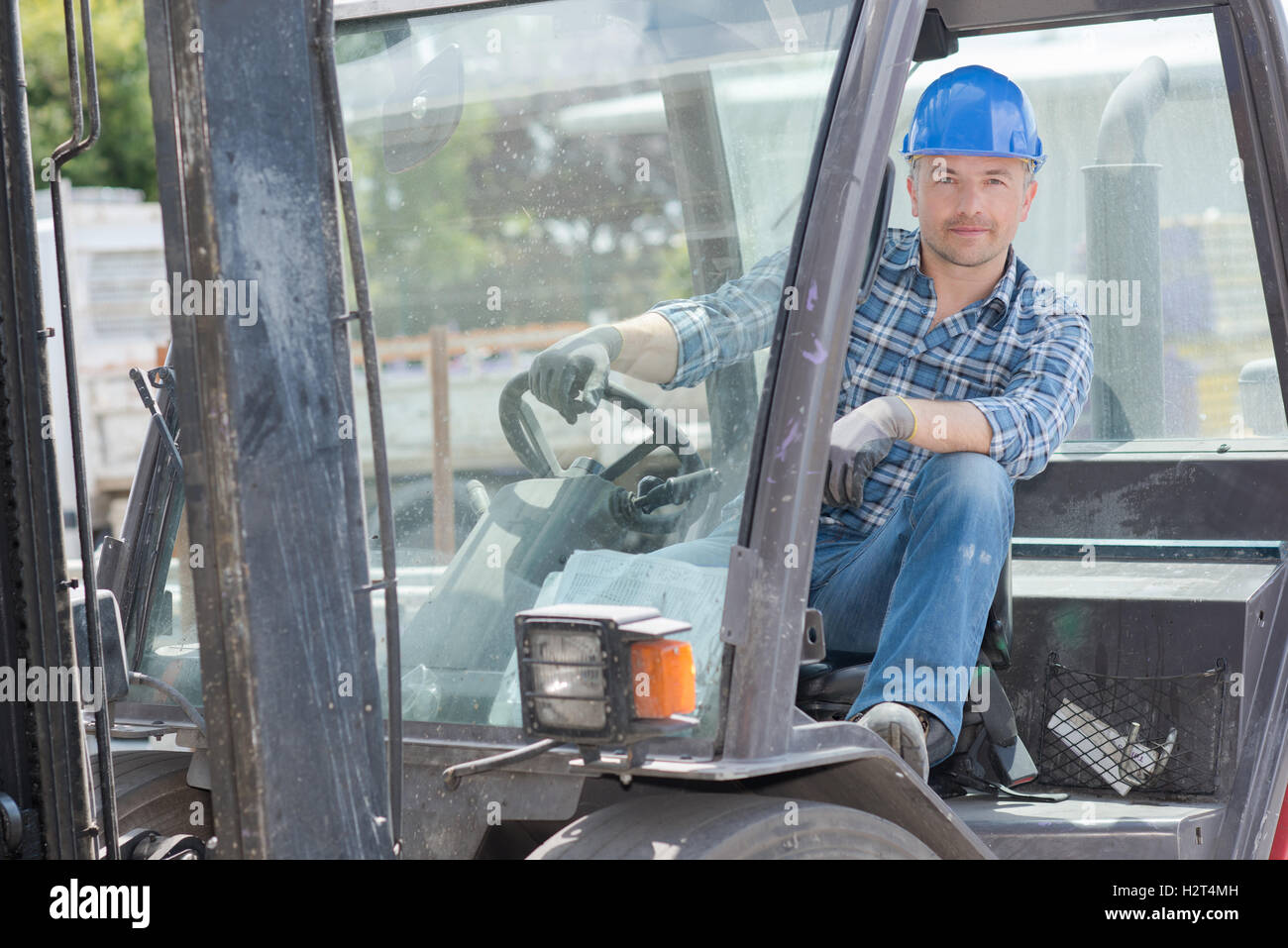 industrial vehicle with driver Stock Photo - Alamy