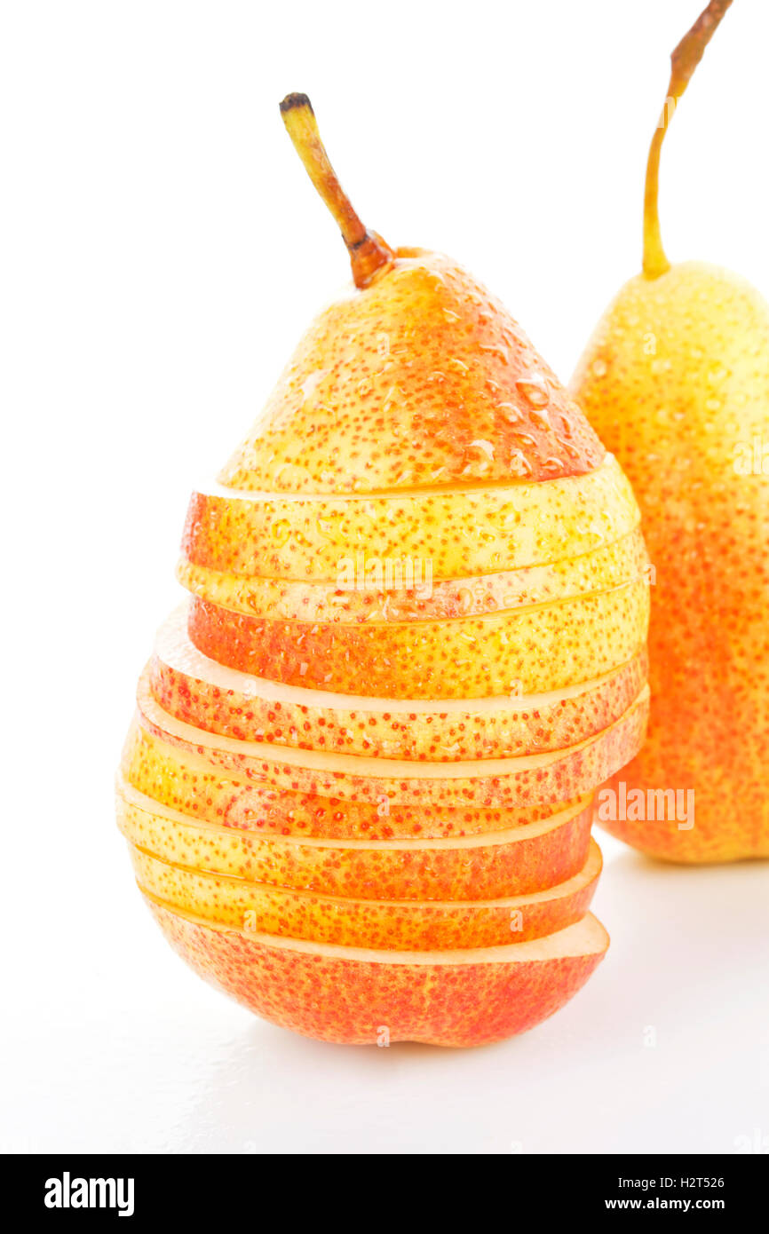 Pear slices isolated Stock Photo - Alamy