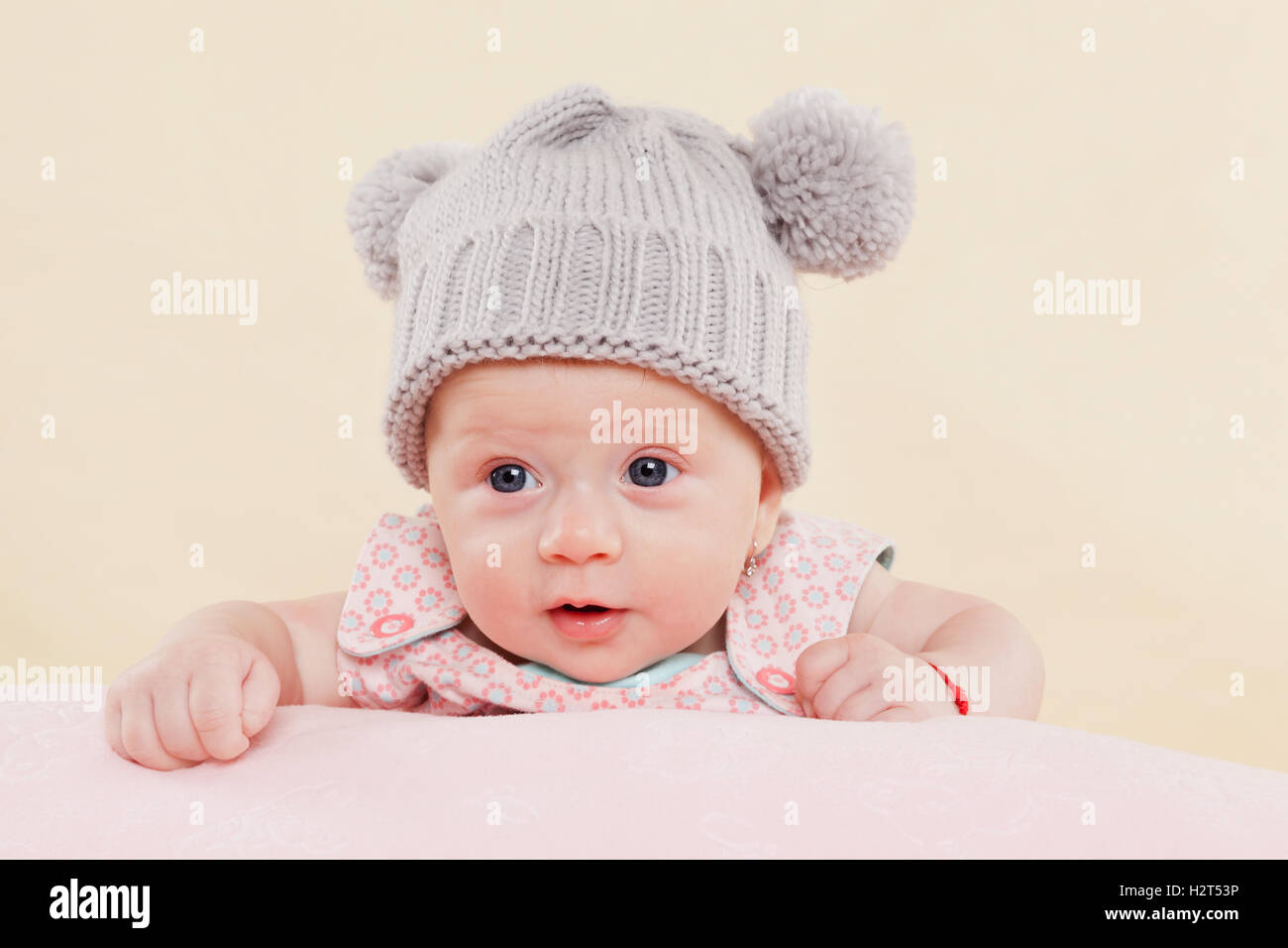 Cute surprised baby girl Stock Photo - Alamy