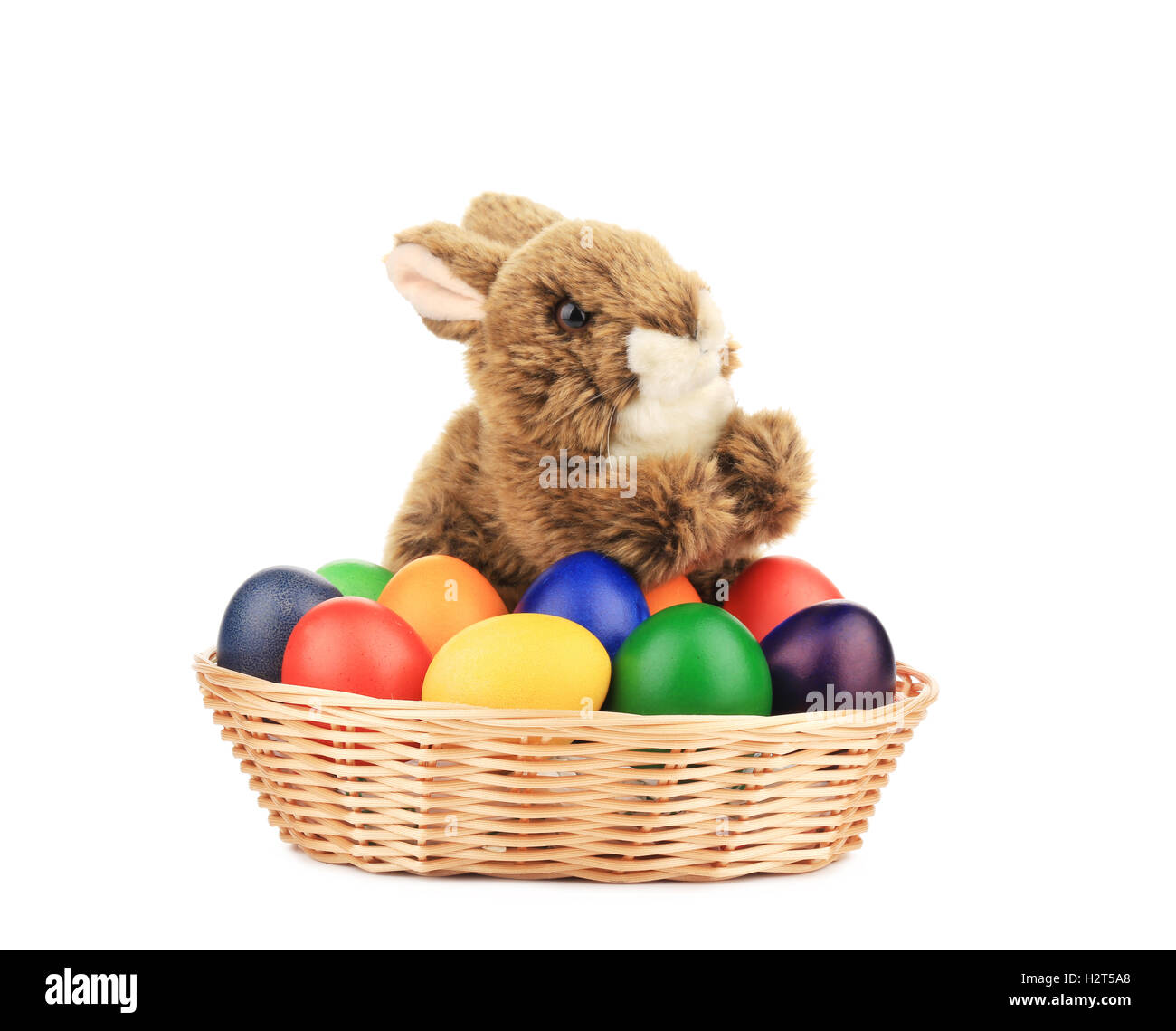 Fluffy foxy rabbit in basket with Easter eggs Stock Photo - Alamy