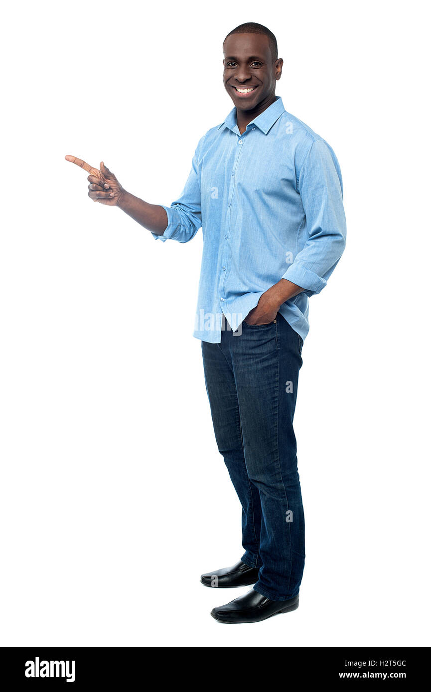 Happy man pointing away Cut Out Stock Images & Pictures - Alamy