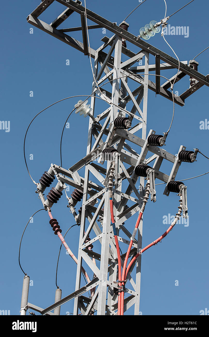 Electricity pylons with high-voltage wires Stock Photo - Alamy
