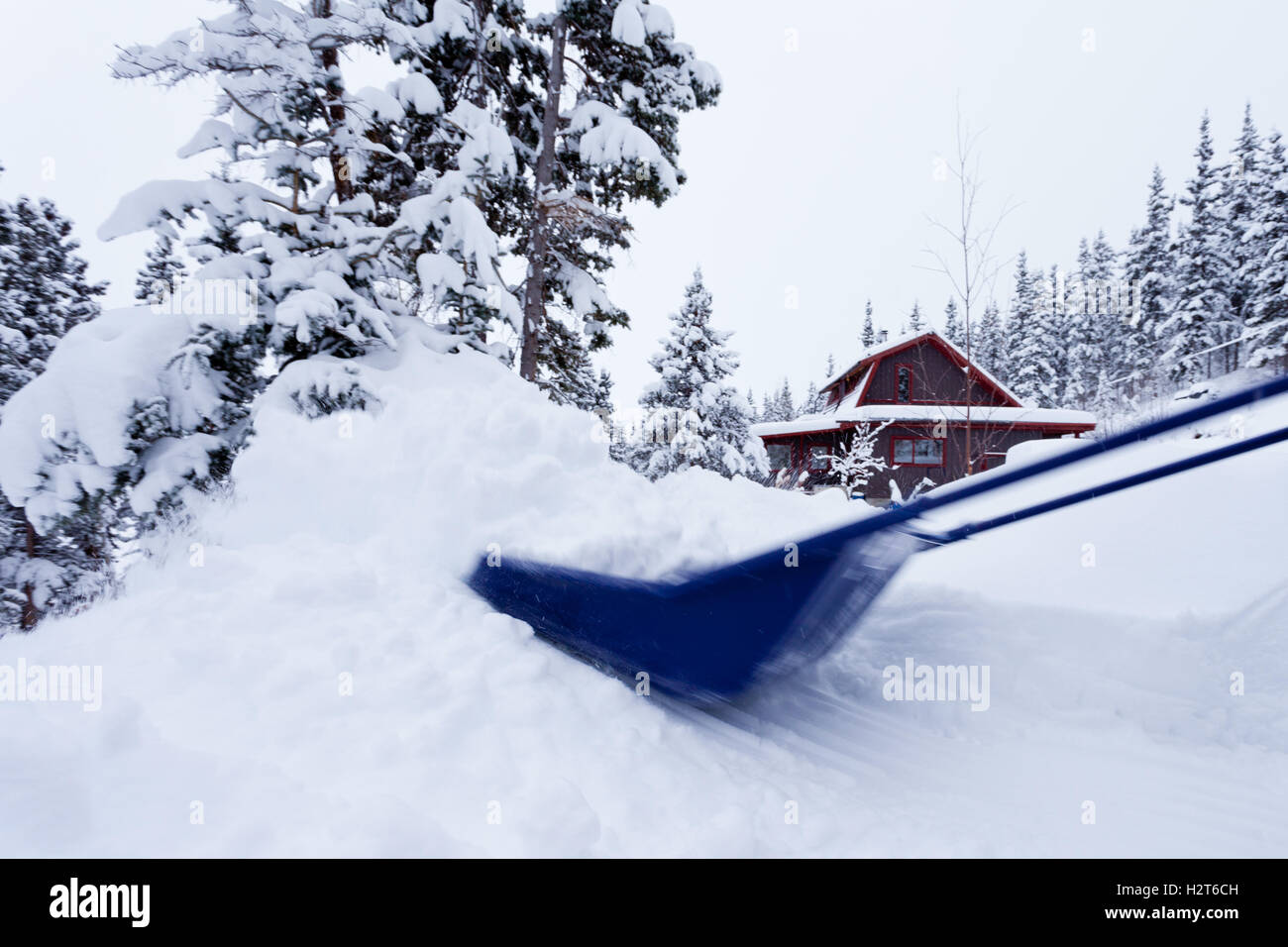 Snow scoop snow-removal blizzard winter snowfall Stock Photo - Alamy