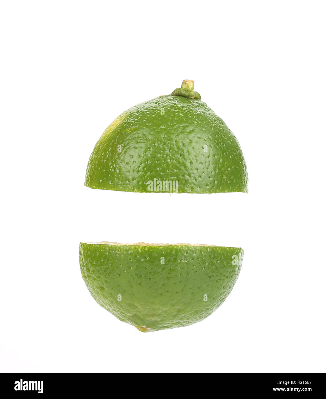 Lime cut in half Stock Photo - Alamy