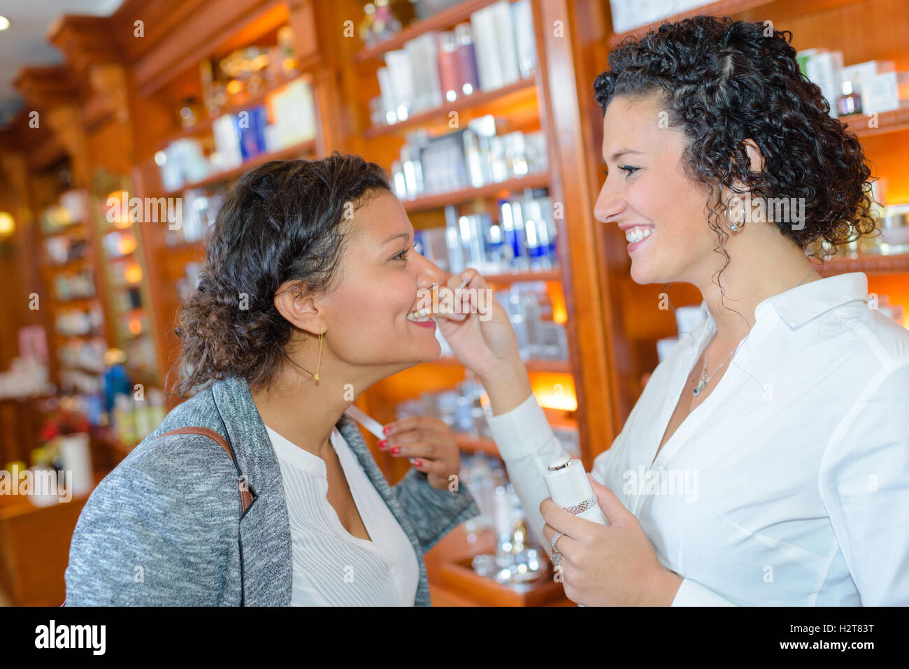 smelling the perfume Stock Photo - Alamy