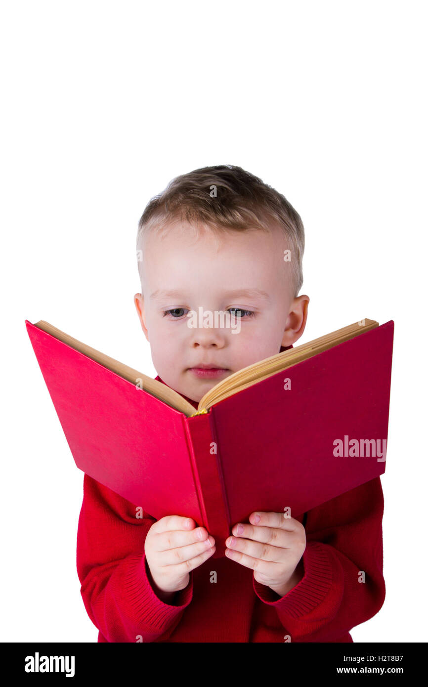 Boy reading a book Stock Photo - Alamy