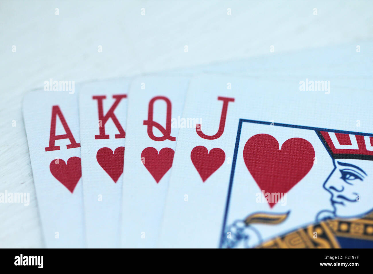 Playing cards with hearts close up macro photo Stock Photo - Alamy