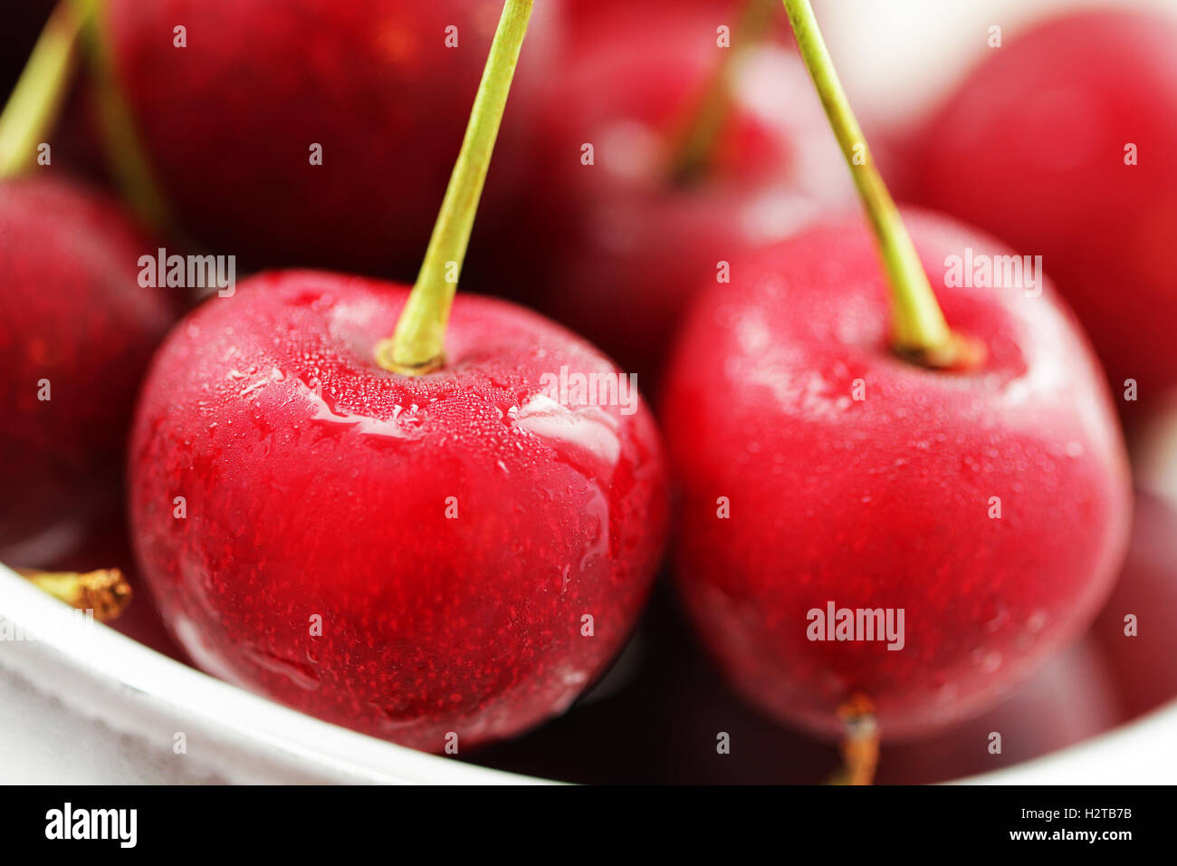 Beautiful red cherry close up macro photo Stock Photo - Alamy