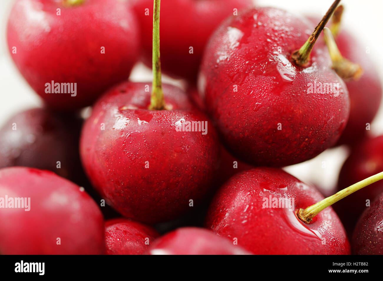 Beautiful red cherry close up macro photo Stock Photo - Alamy
