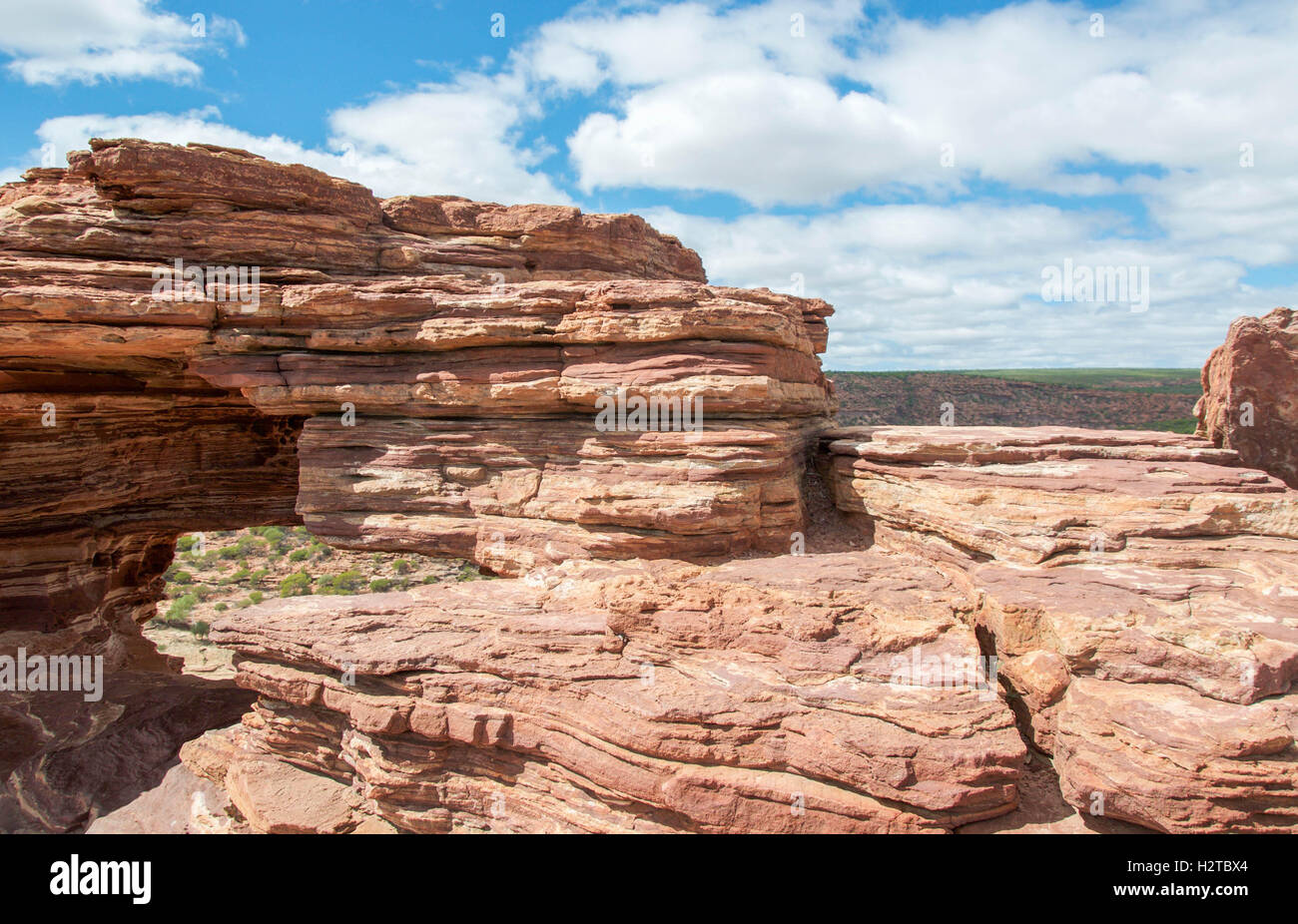 The edge of the infamous "Nature's Window" made of sandstone rock in ...