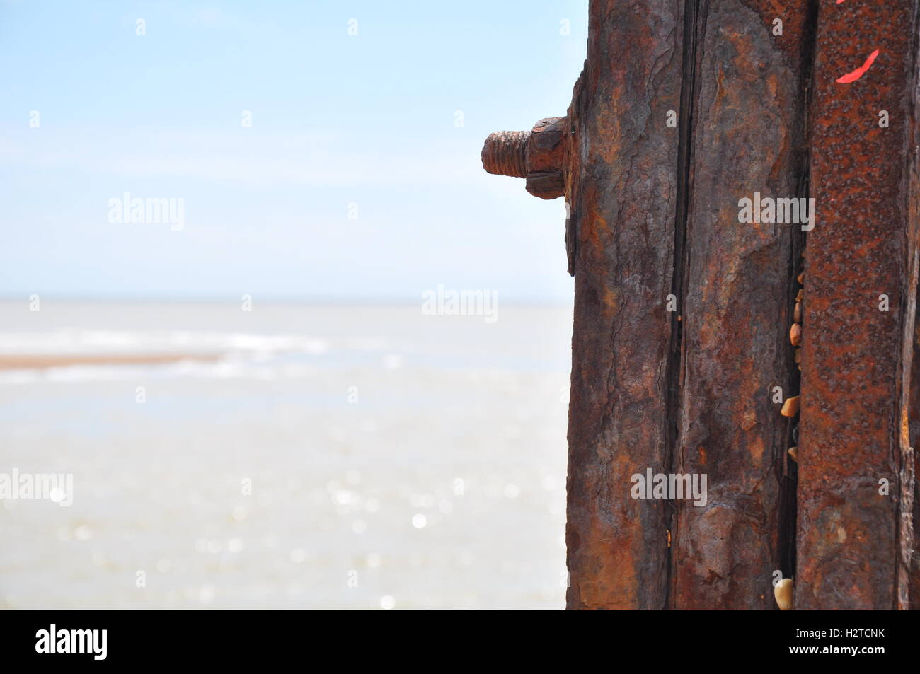 Rusty post Felixstowe Stock Photo - Alamy