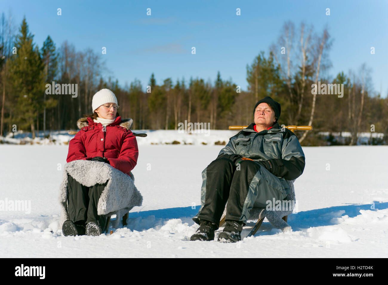 Enjoying the early spring sun Stock Photo - Alamy