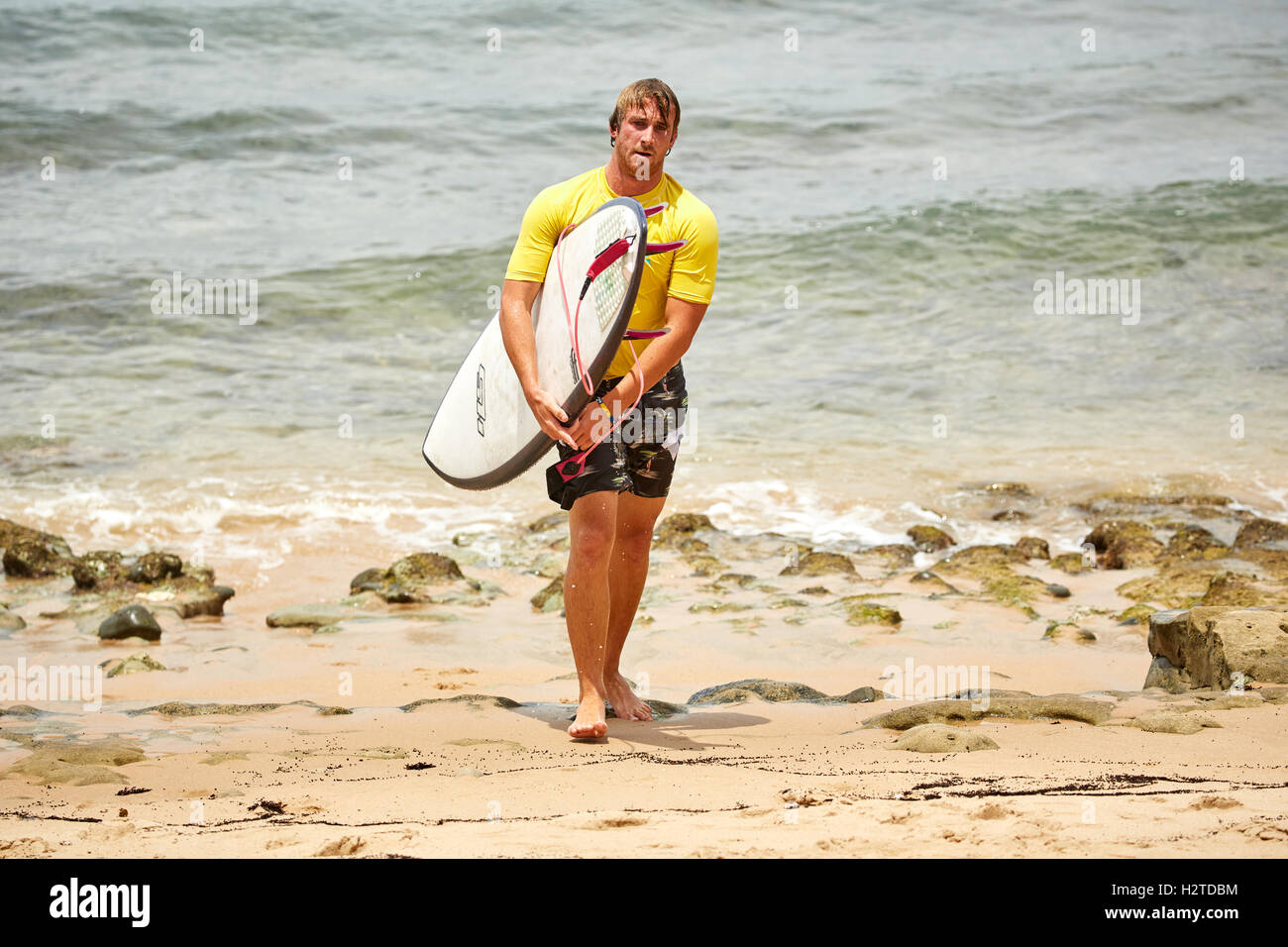 Barbados atlantic coast Bathsheba rocks pretty Young male boy man ...