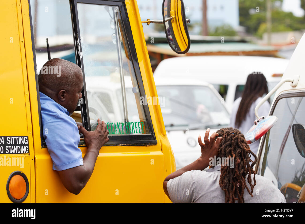 Women at bus stop hi-res stock photography and images - Alamy