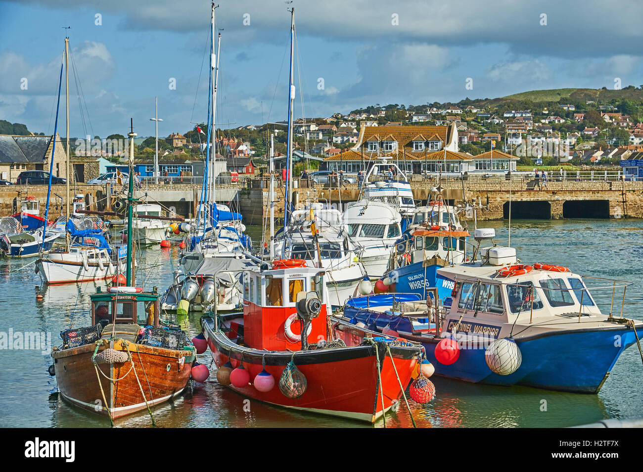 West Bay in Dorset is a small working harbour seen here with a mix of ...
