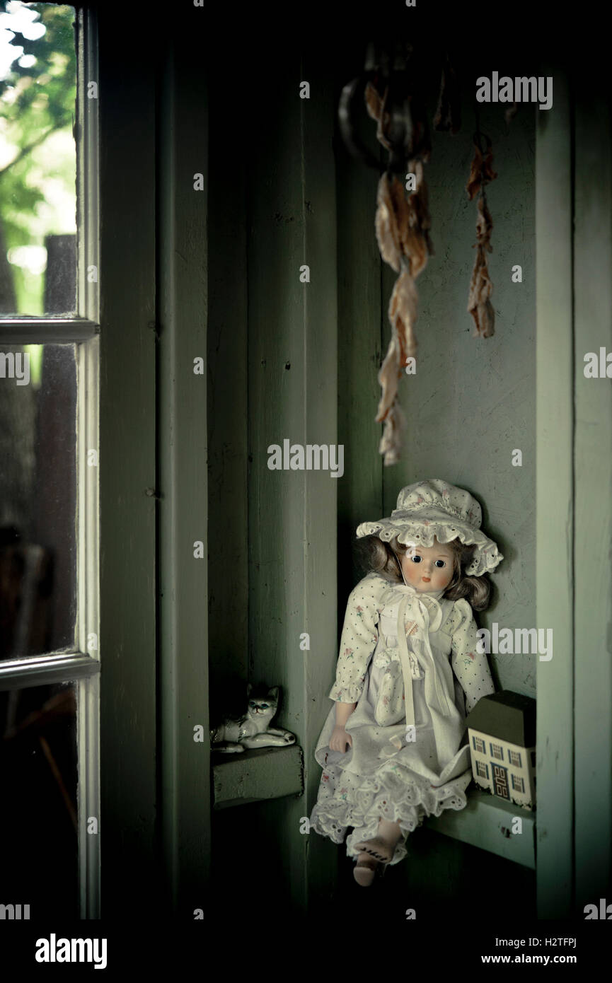 Traditional doll in a rustic house Stock Photo - Alamy