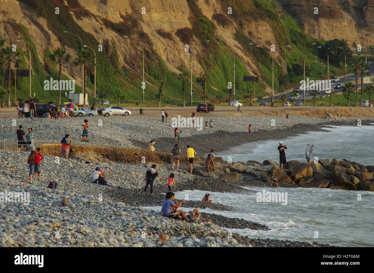Lima, Peru - December 30, 2013: People on Lima city beach at sunset in ...