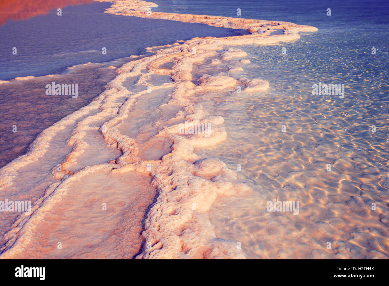 Texture of Dead Sea at sunrise. Salty sea shore background in trendy ...