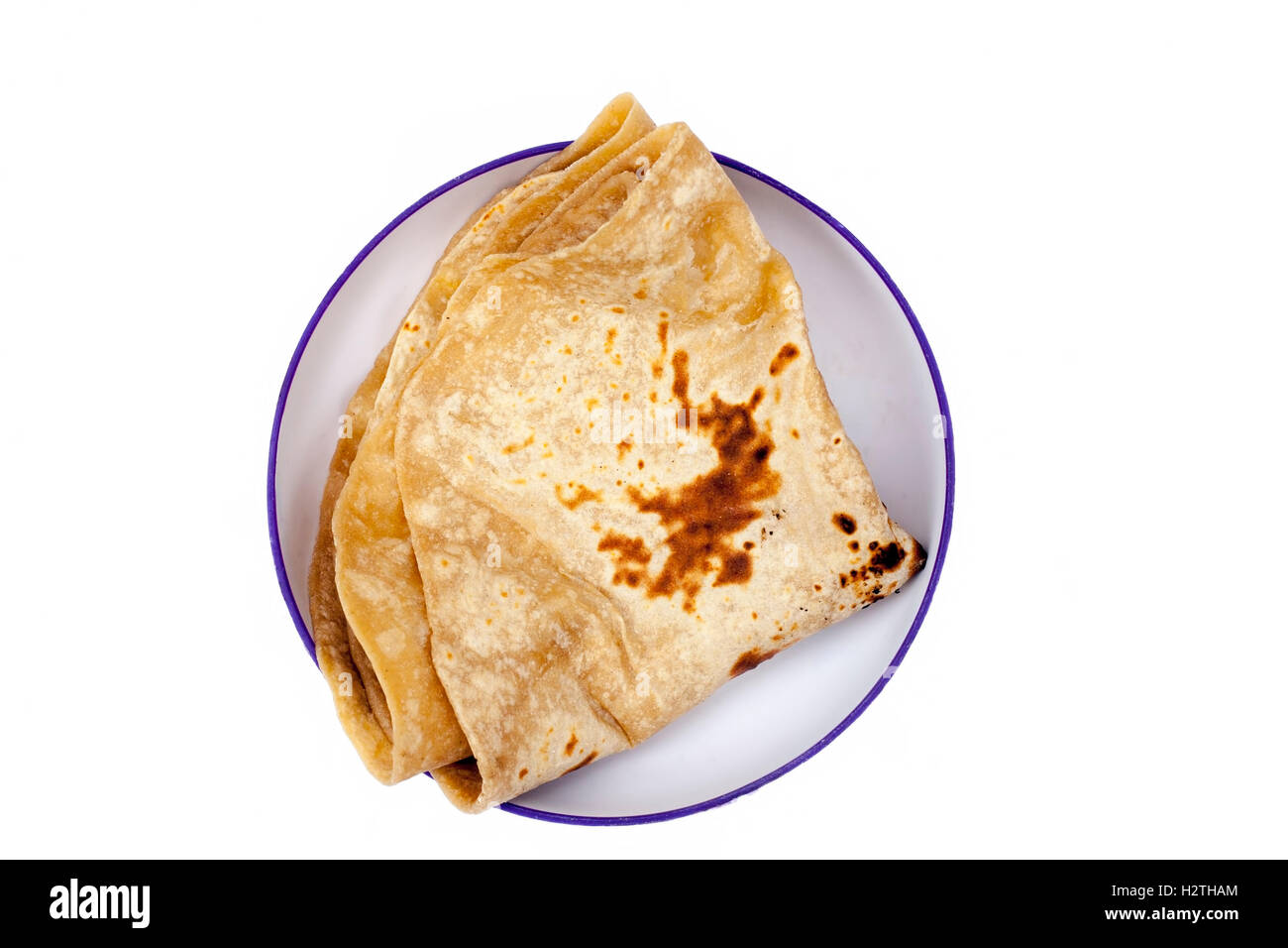 Indian Roti on traditional Indian Plate, isolated on white Stock Photo ...