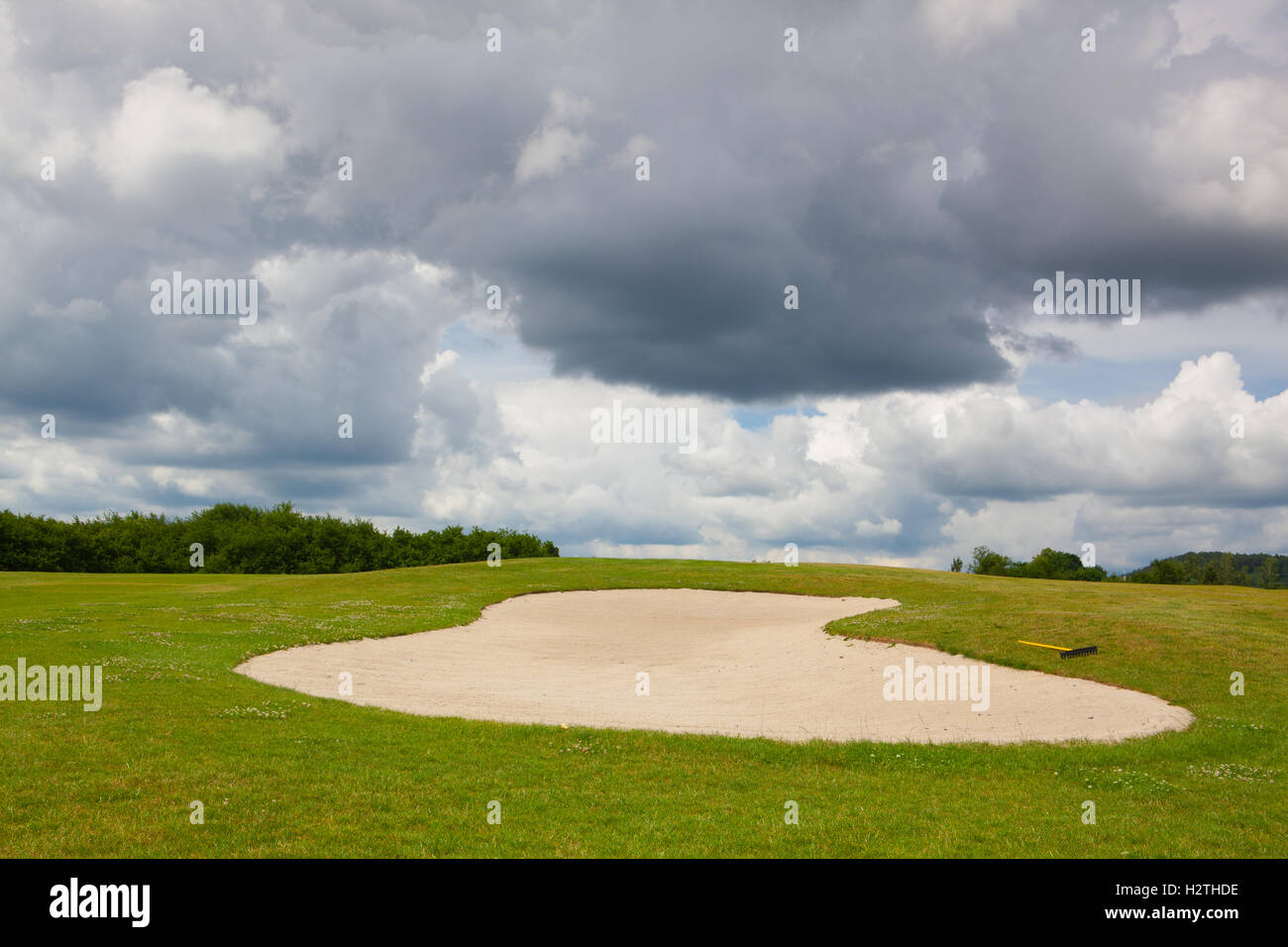 Sand golf bunker on a empty golf course before storm Stock Photo - Alamy