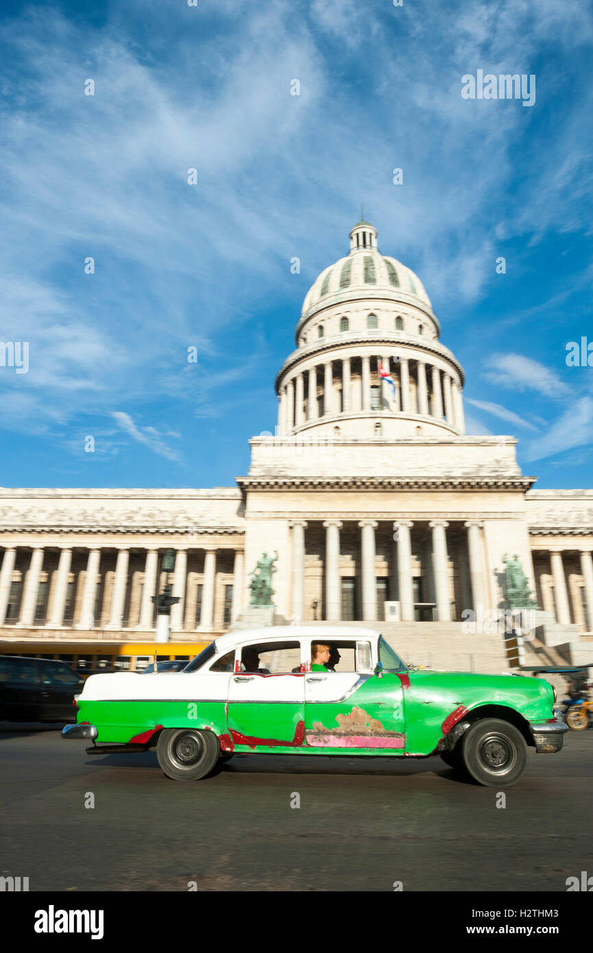 HAVANA - JUNE 17, 2011: Classic American Cuban taxi car passes in front ...