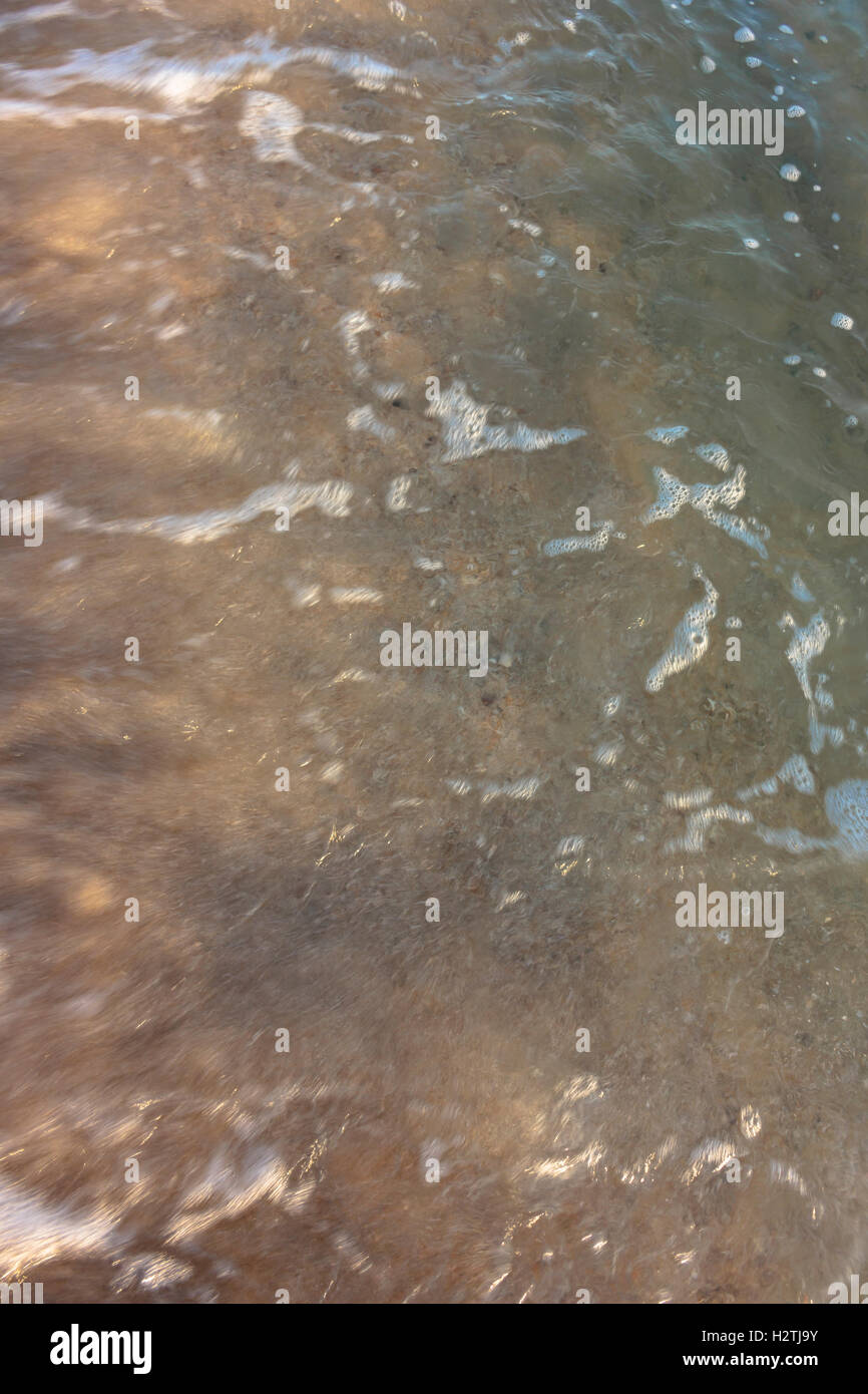 Wave and sandy shore background songkhla beach Stock Photo - Alamy