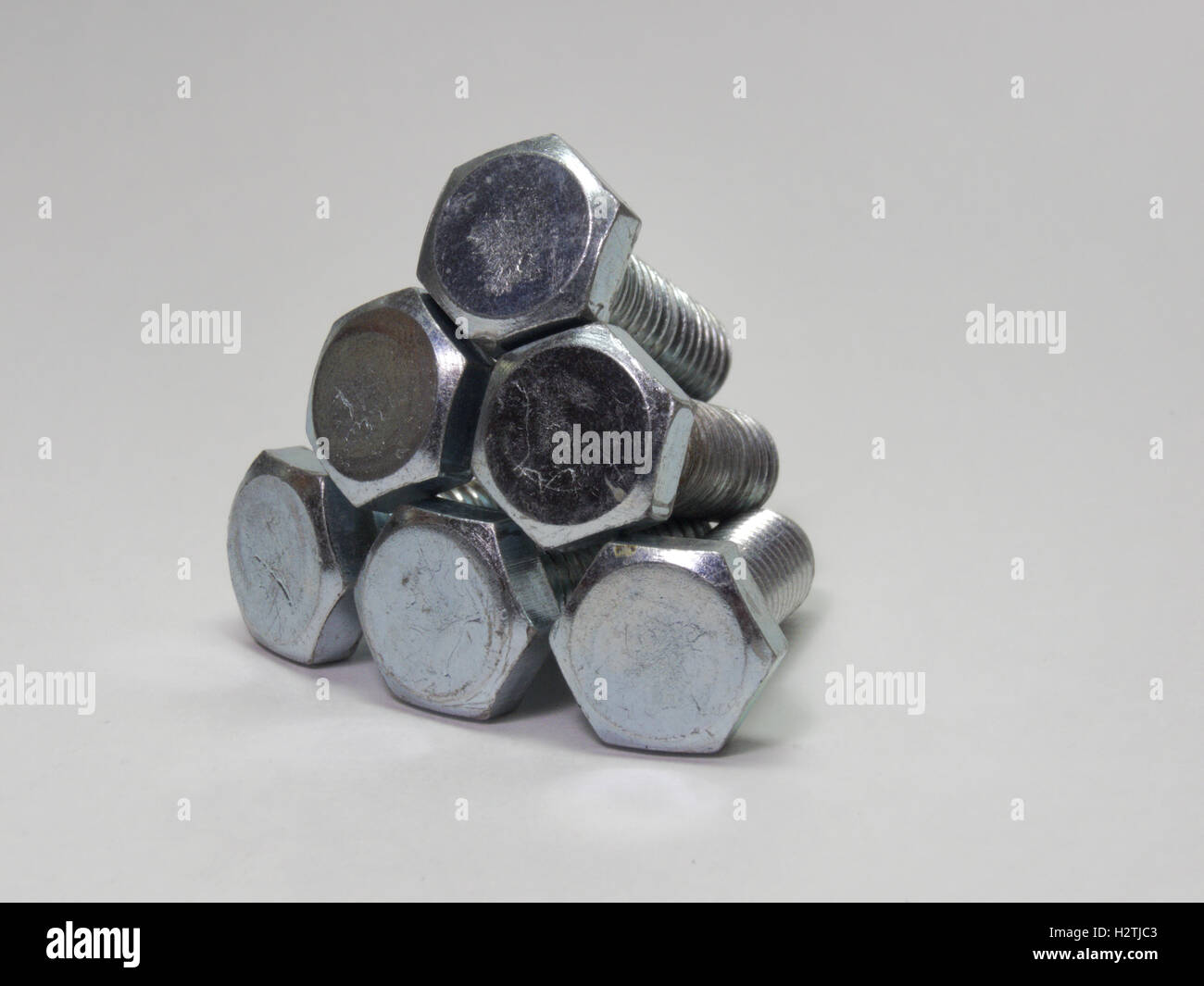 The pyramid of the connecting bolts. Connecting elements Stock Photo ...