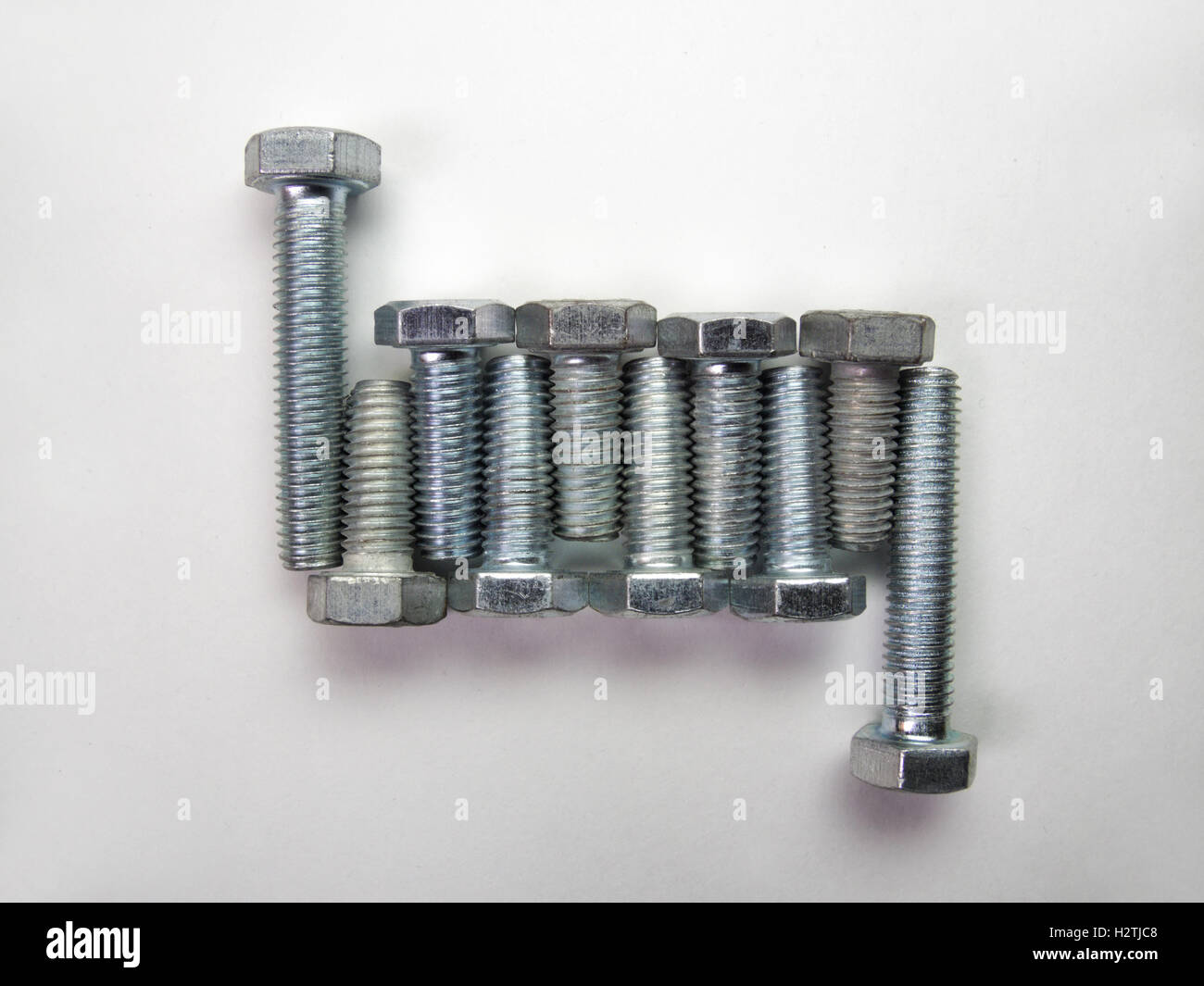 Bolts, ladder layout, intersecting threads Stock Photo - Alamy