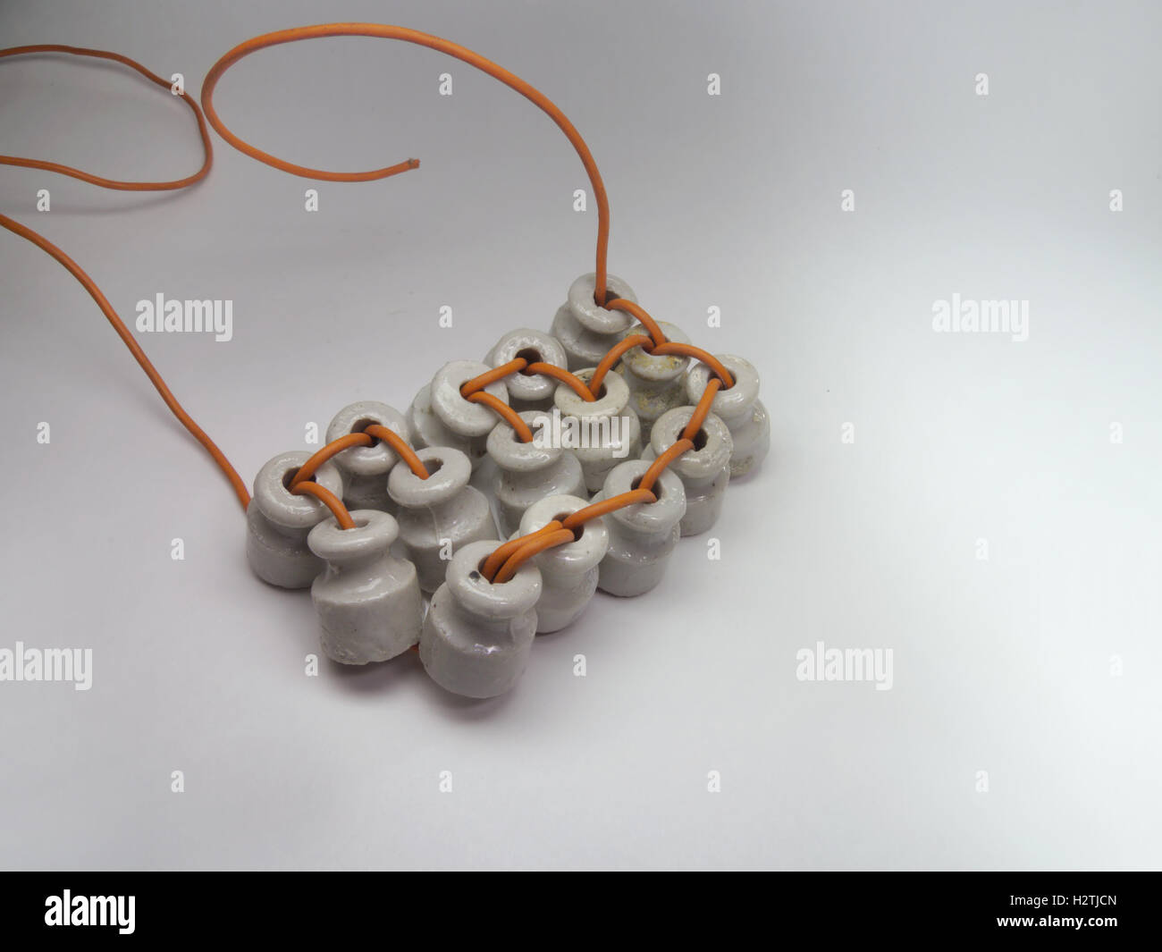 bunch of ceramic insulators small size, bonded with wires Stock Photo ...