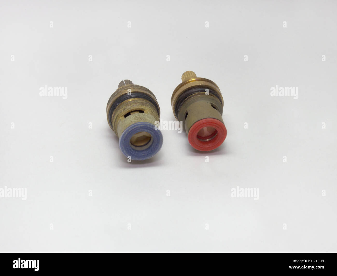 Two Ceramic shut-off valves for hot and cold water. On white background ...