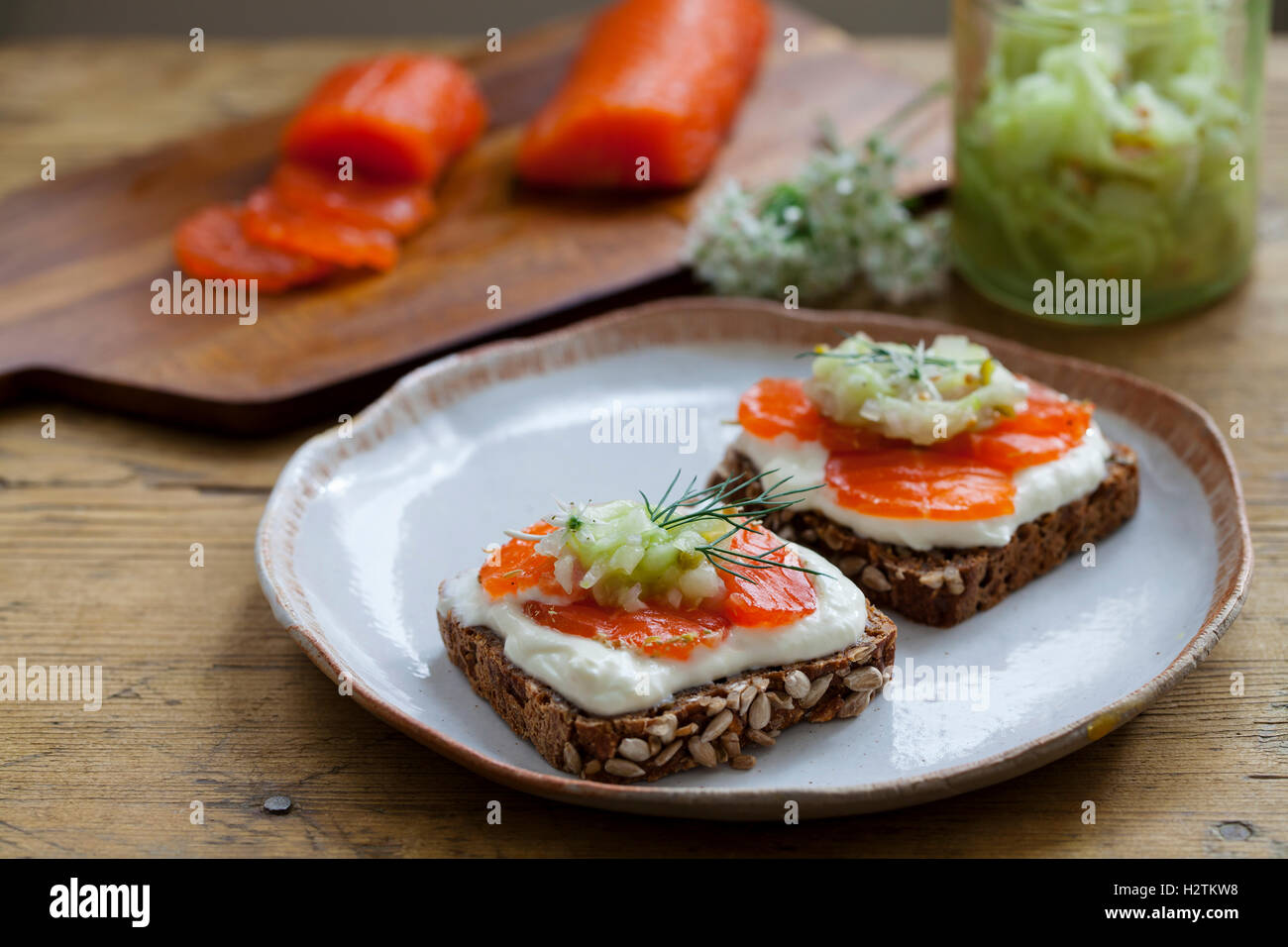 Scandinavian dark bread with cured trout , micro herbs, cucumber ...