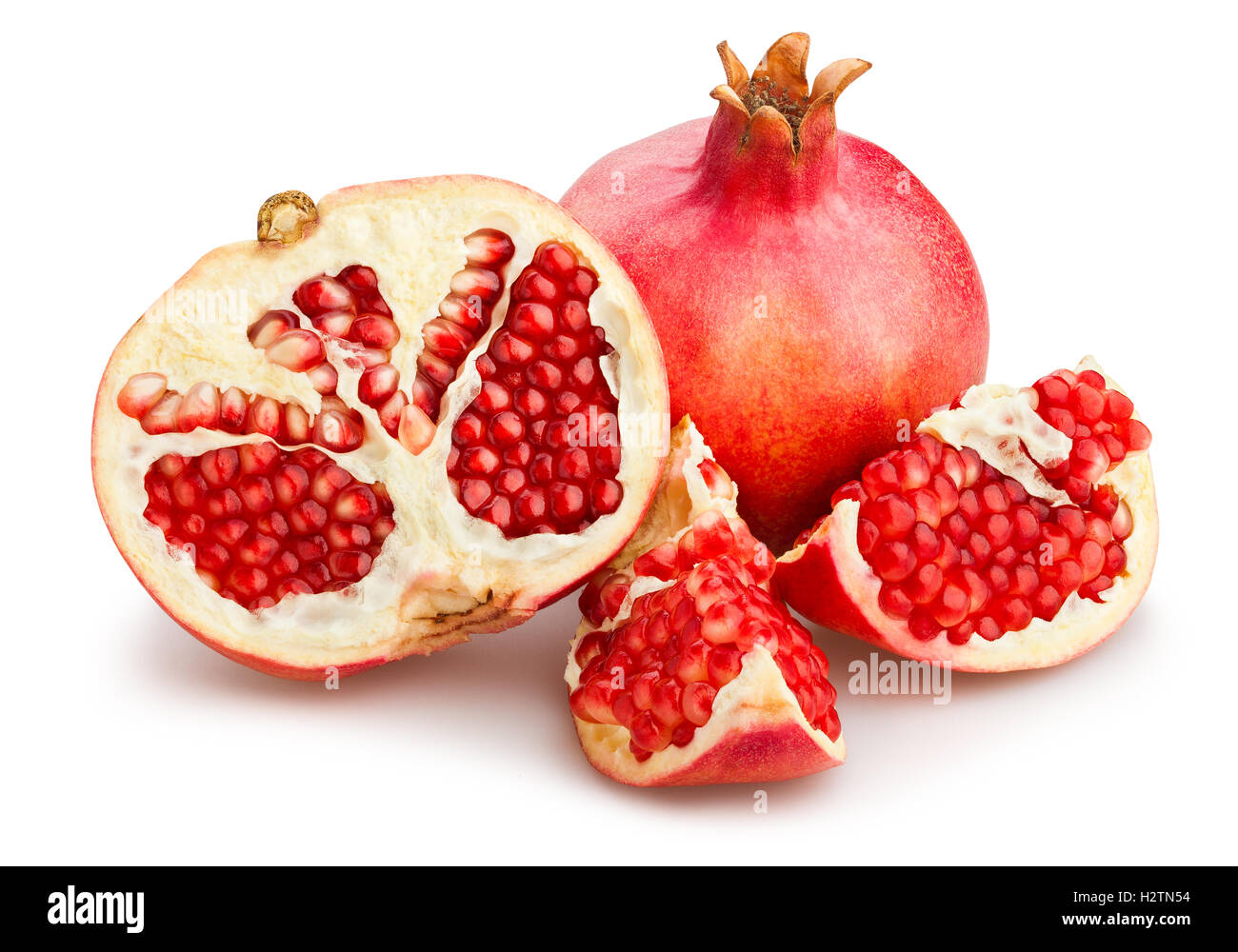 sliced pomegranate isolated Stock Photo - Alamy