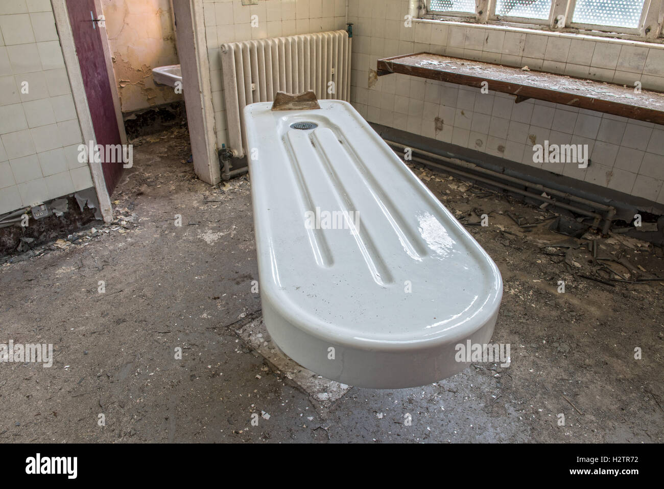 An increasingly rare porcelain autopsy table within the derelict Maiden ...