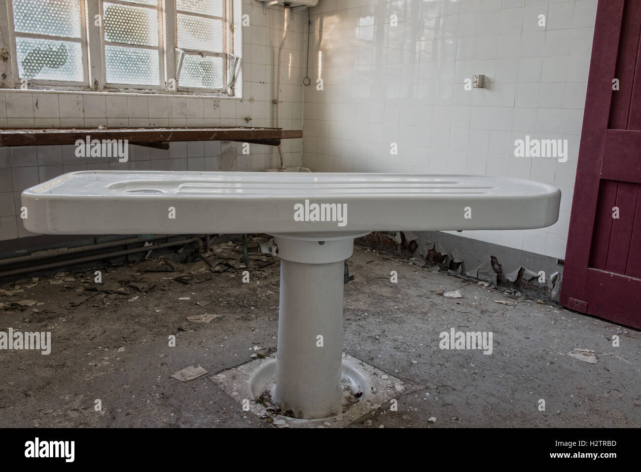 An increasingly rare porcelain autopsy table within the derelict Maiden ...